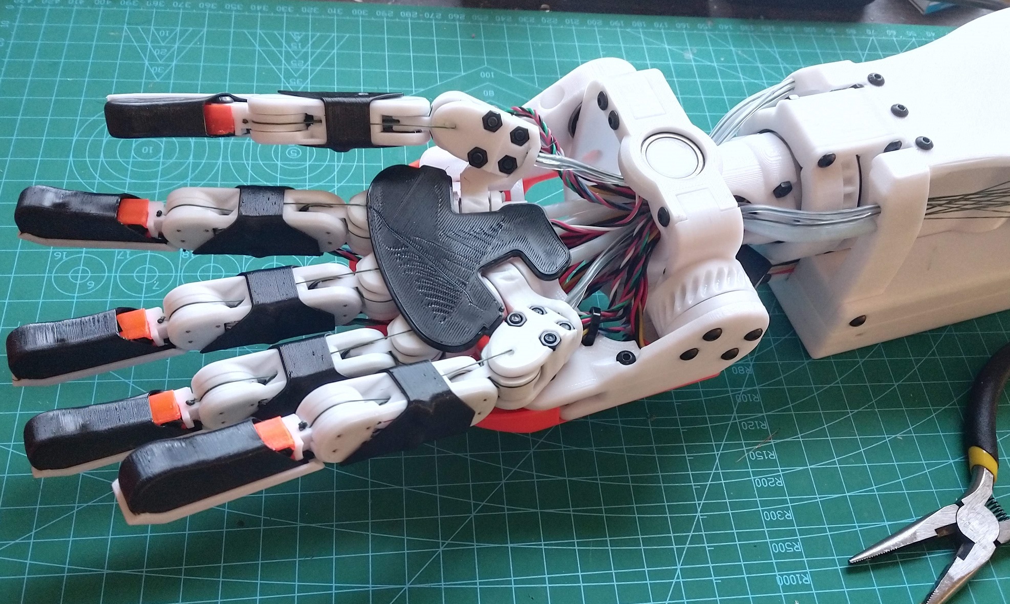 GitHub - csiz/hextech-mecha-hand: Full range of motion robotic hand with pressure, position and ...